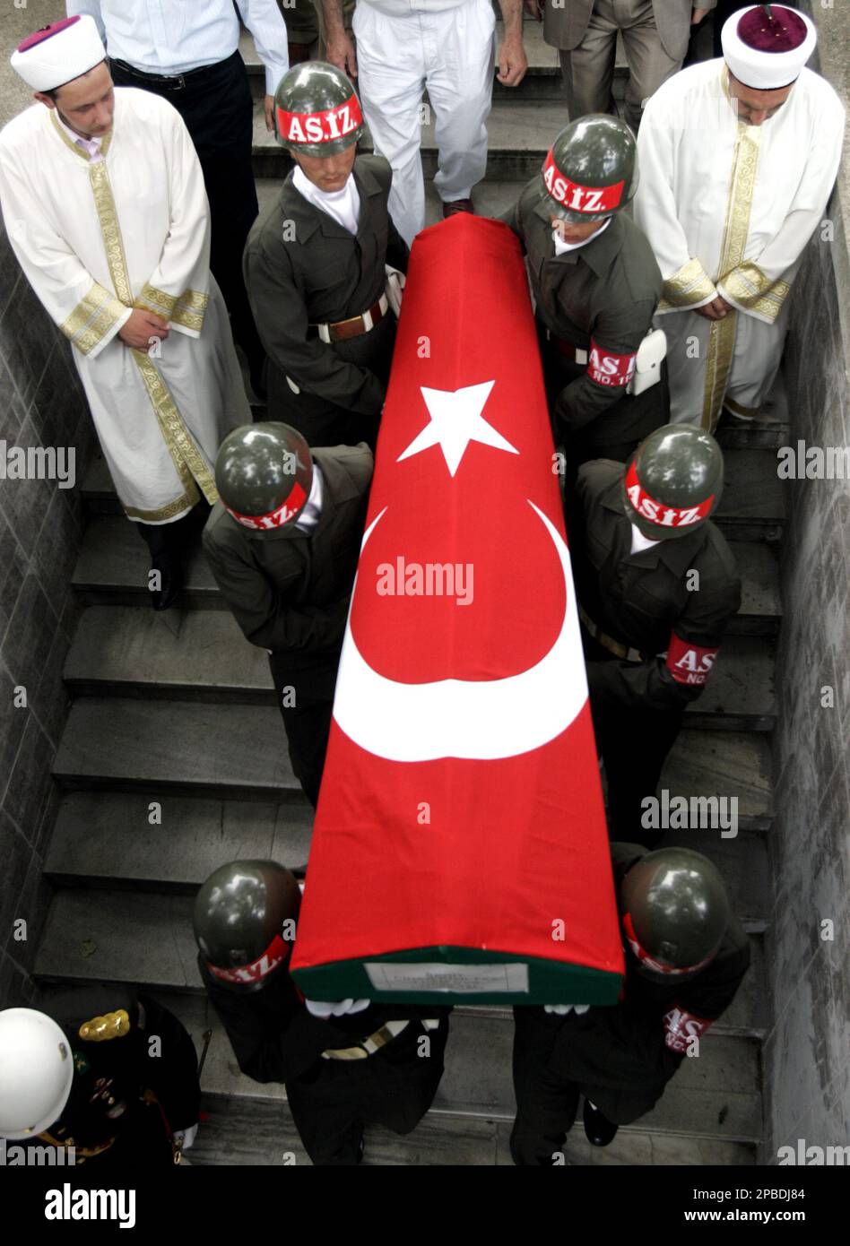 Turkish flag-wrapped coffin of the slain army corporal Cihan Kiziltas ...