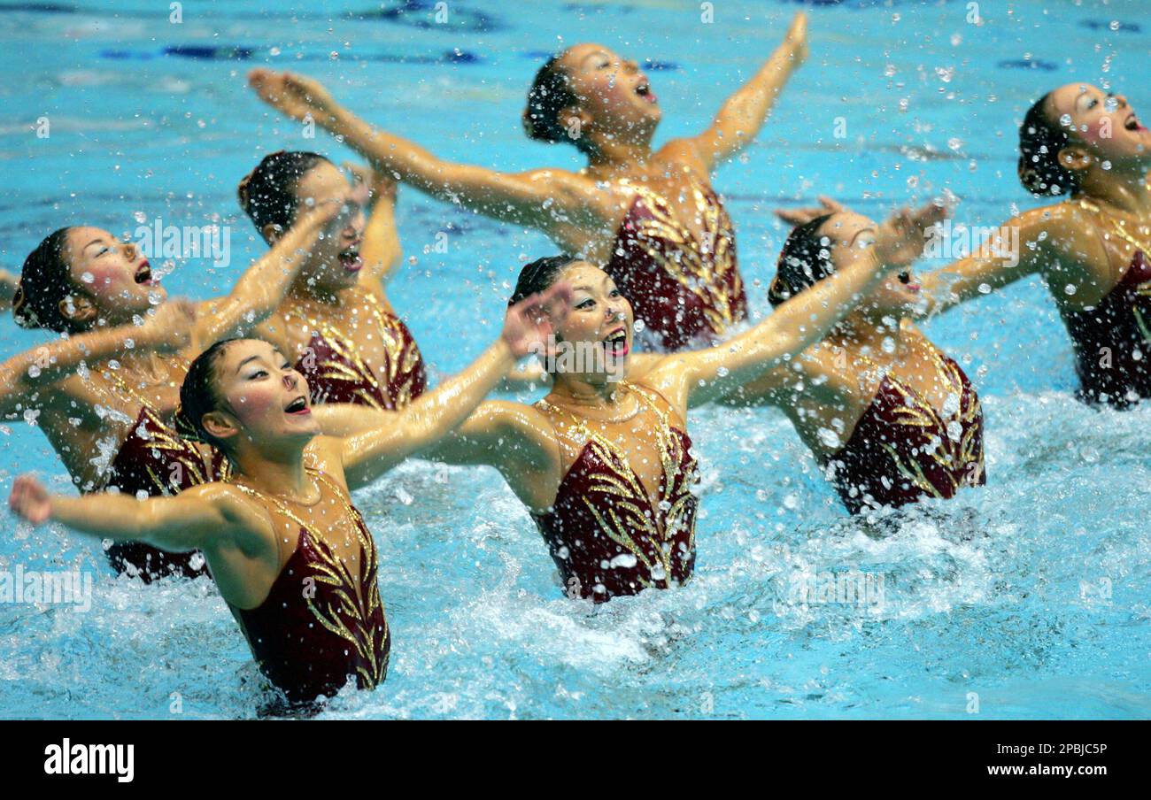 Japan's team performs during a free combination final of the Japan Open ...