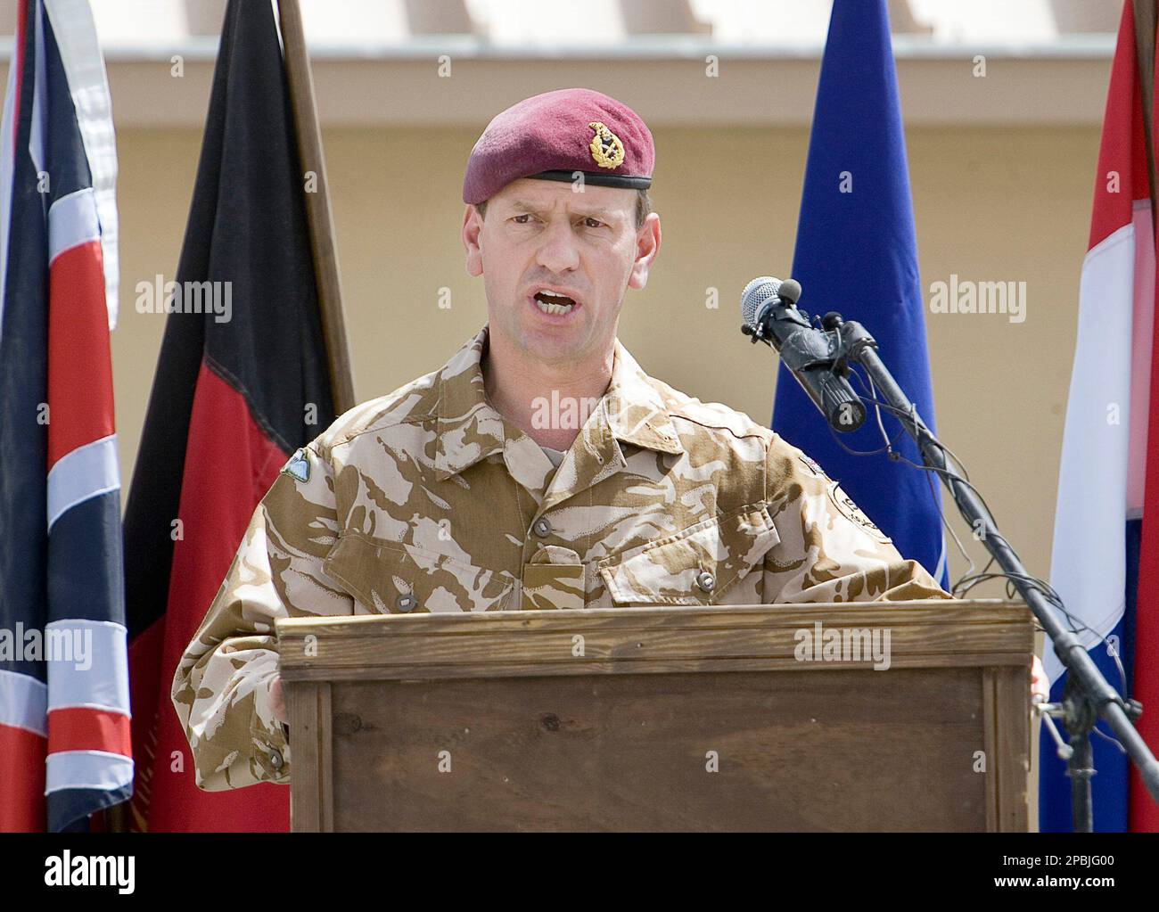 Major General Jacko Page, left, from Britain, speaks to soldiers and ...