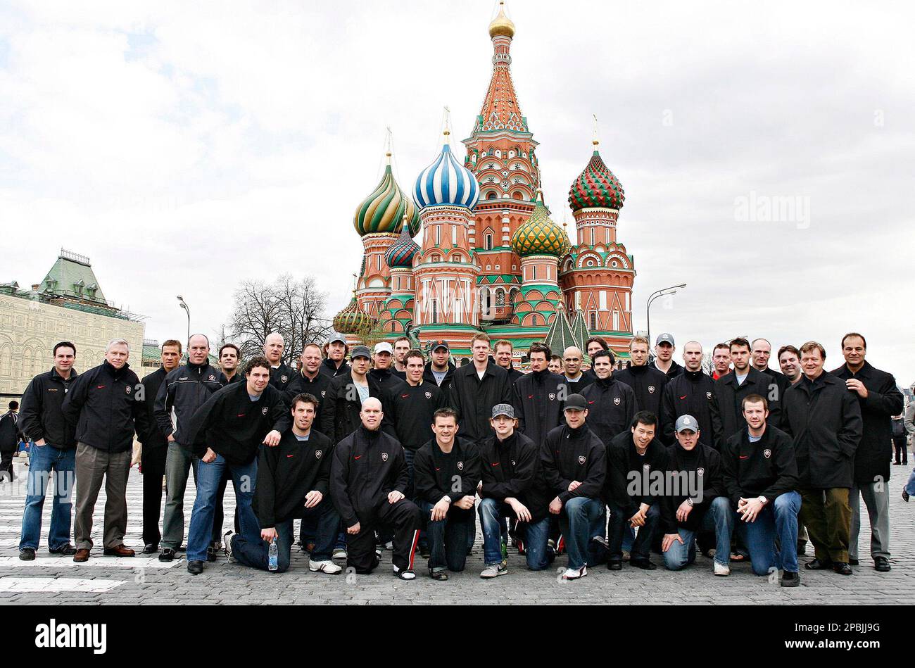 Team Canada players and staff pose in front of St. Basil's Cathedral on Red Square Sunday, April ...