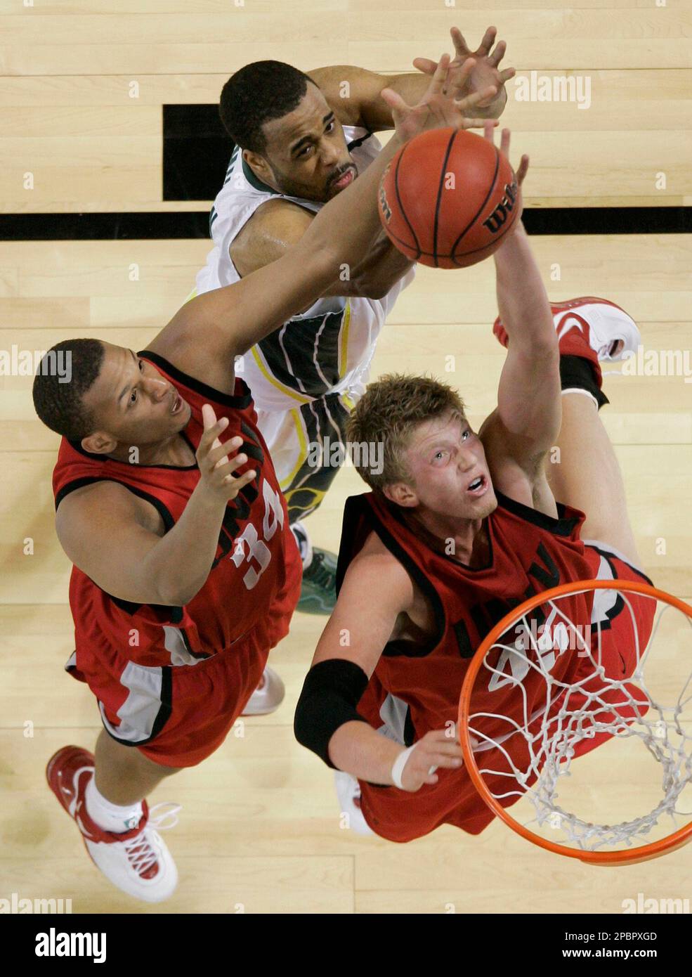 Oregon's Malik Hairston, top, goes up for a rebound with UNLV's Matt ...