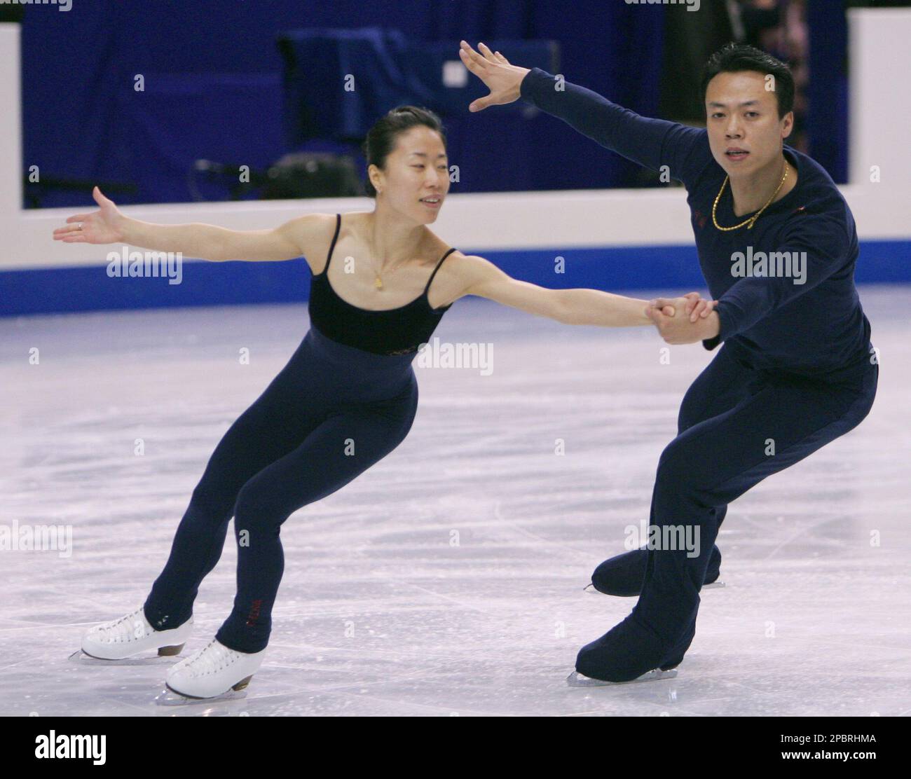 Chinese pair Shen Xue, left, and Zhao Hongbo work out during an ...