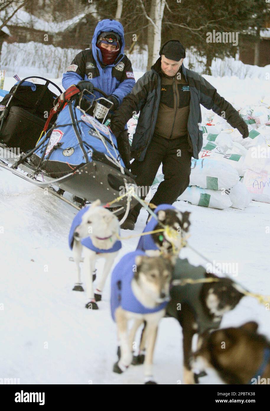 Iditarod Trail Sled Dog Race veteran and race judge Lavon Barve, right ...