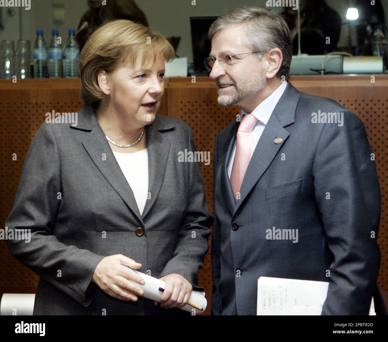 German Chancellor Angela Merkel, left, shares a word with Lithuanian ...