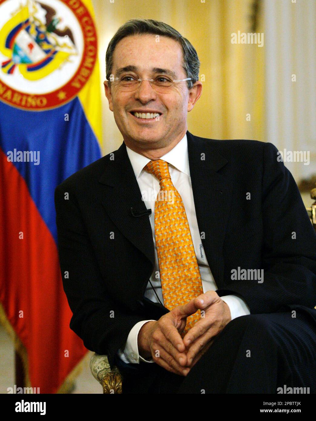 Colombia's President Alvaro Uribe smiles during an interview with The ...