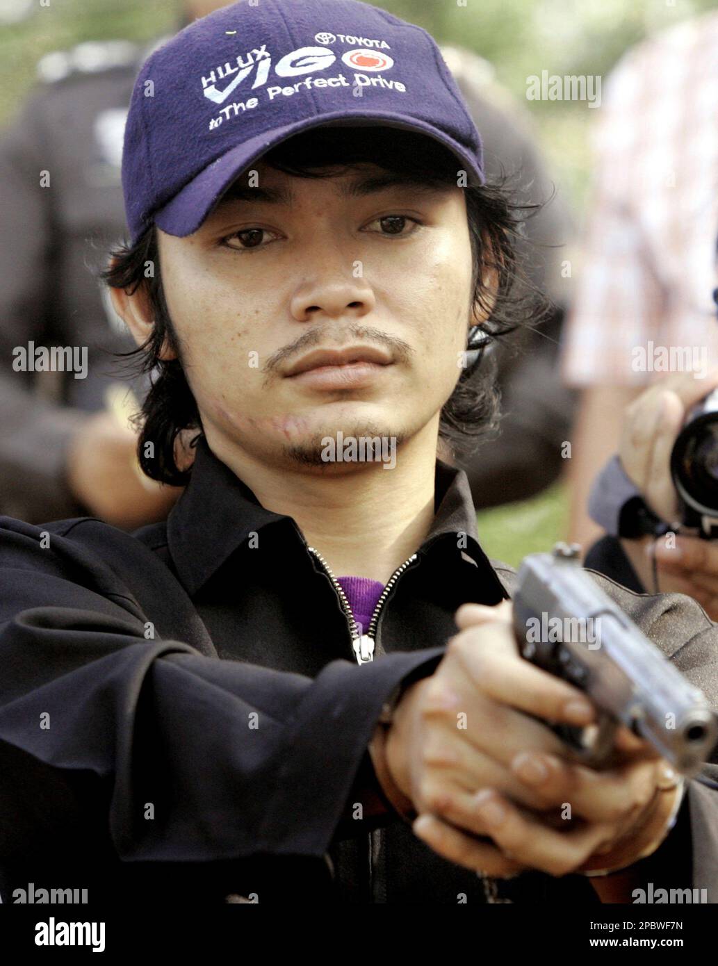 Anuchit Lamlert, 24, a Thai man who was arrested for the murders of two ...