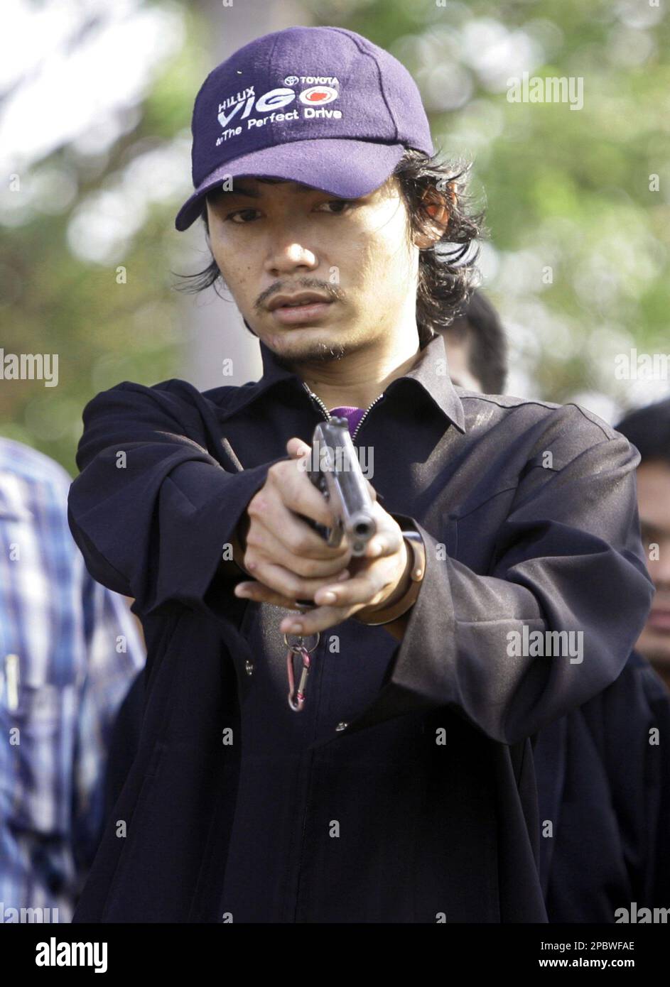 Anuchit Lamlert, 24, a Thai man who was arrested for the murders of two ...