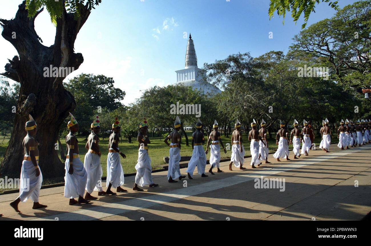 Young boys participate in a ceremony to be ordained as Samanera, or a ...