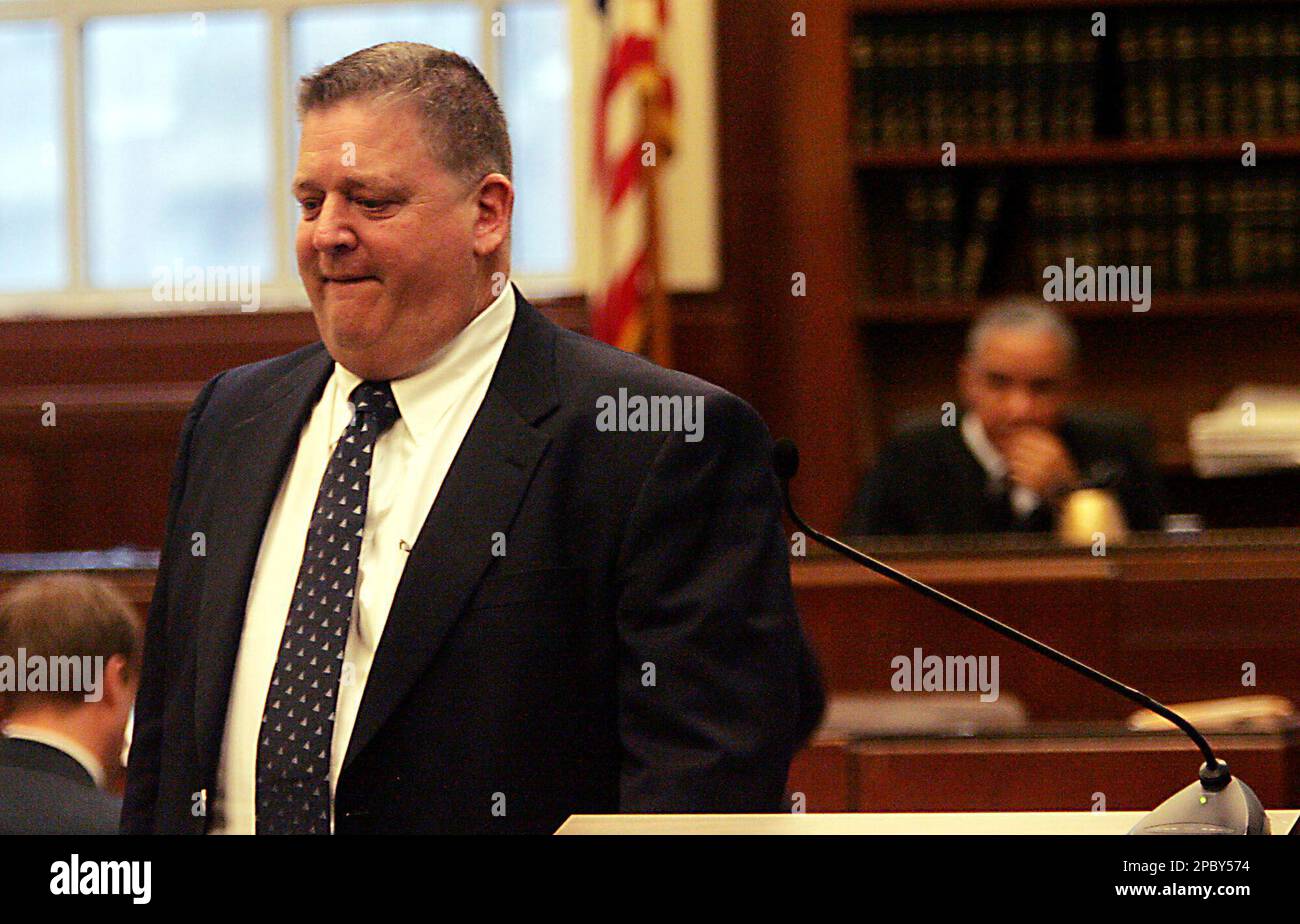 Notre Dame coach Charlie Weis gets back to his seat, after testifying ...
