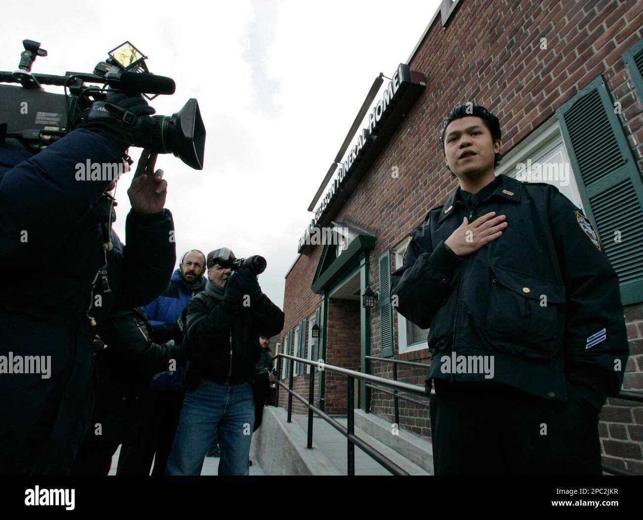 Ceasar Borja answers questions during a news interview before the ...