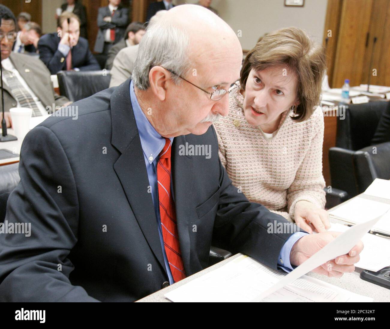 Sen. Sue Madison, D-Fayetteville, right, speaks with Sen. Jim Luker, D ...
