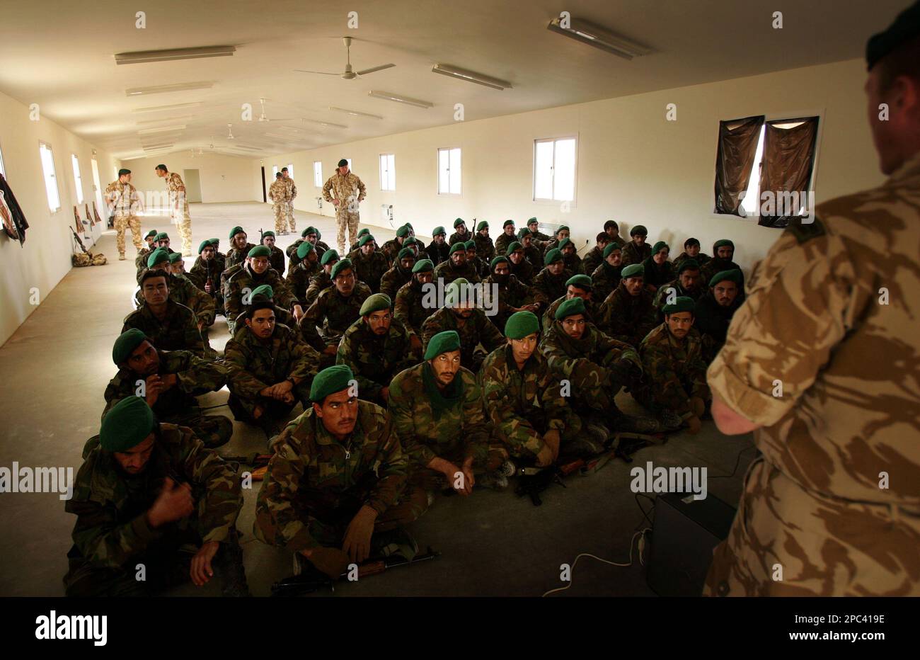 Afghan National Army or ANA soldiers listen to a British army ...