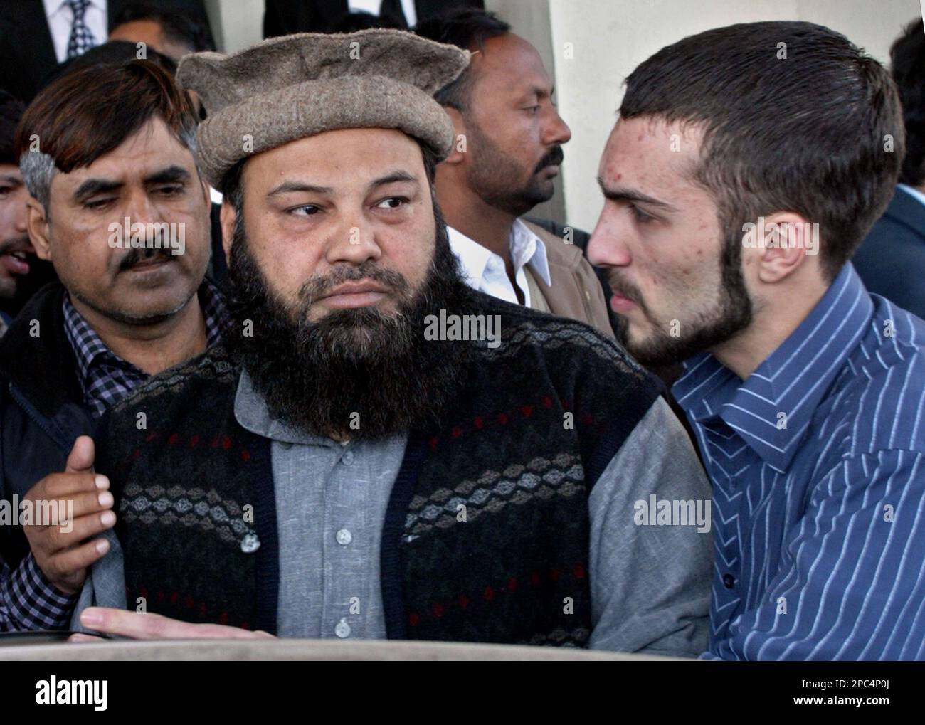Sajad Ahmed Rana, center, father of Scottish girl Molly Campbell, also ...
