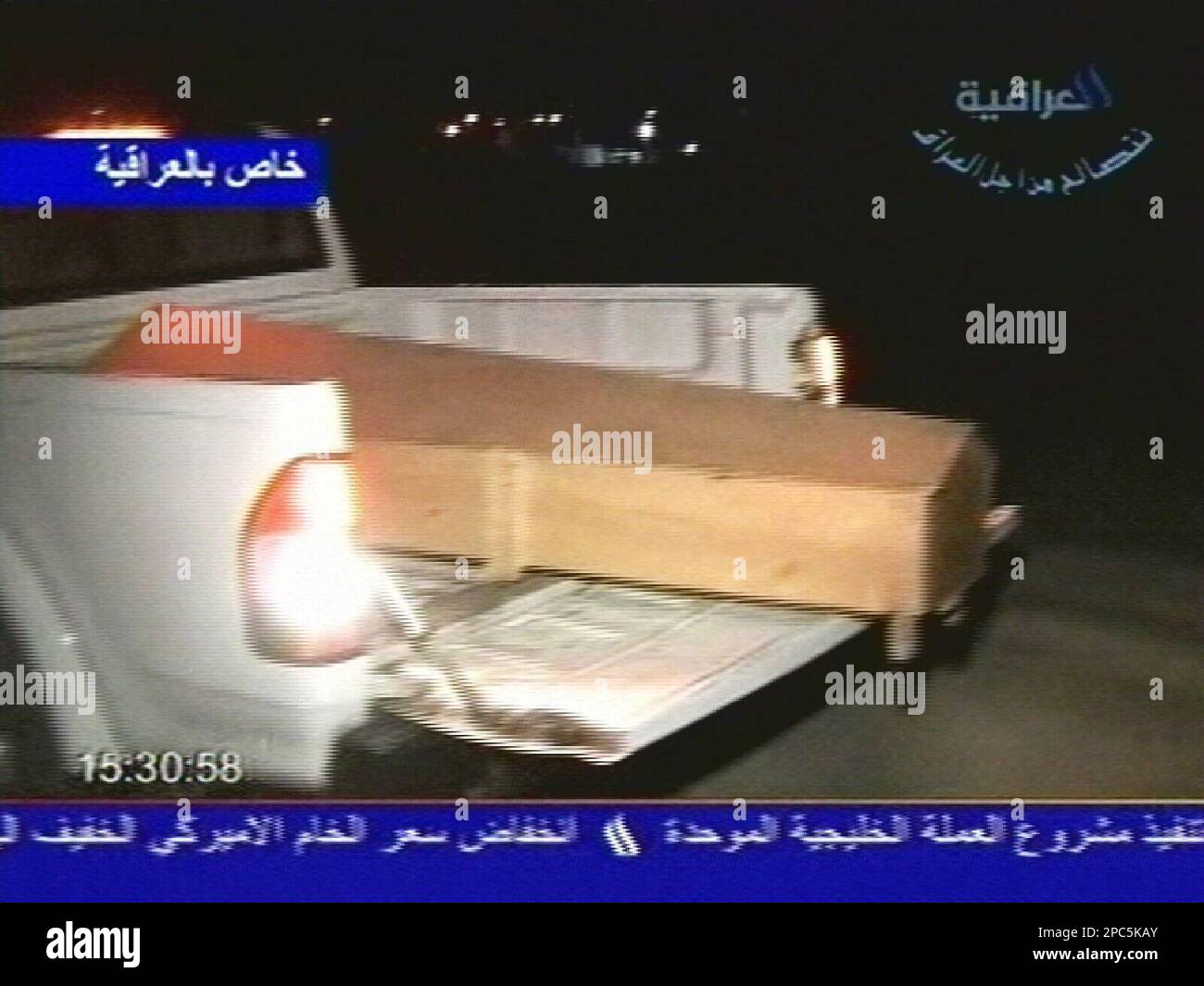 This image taken from Al-Iraqiya television Sunday, Dec. 31, 2006 shows ...