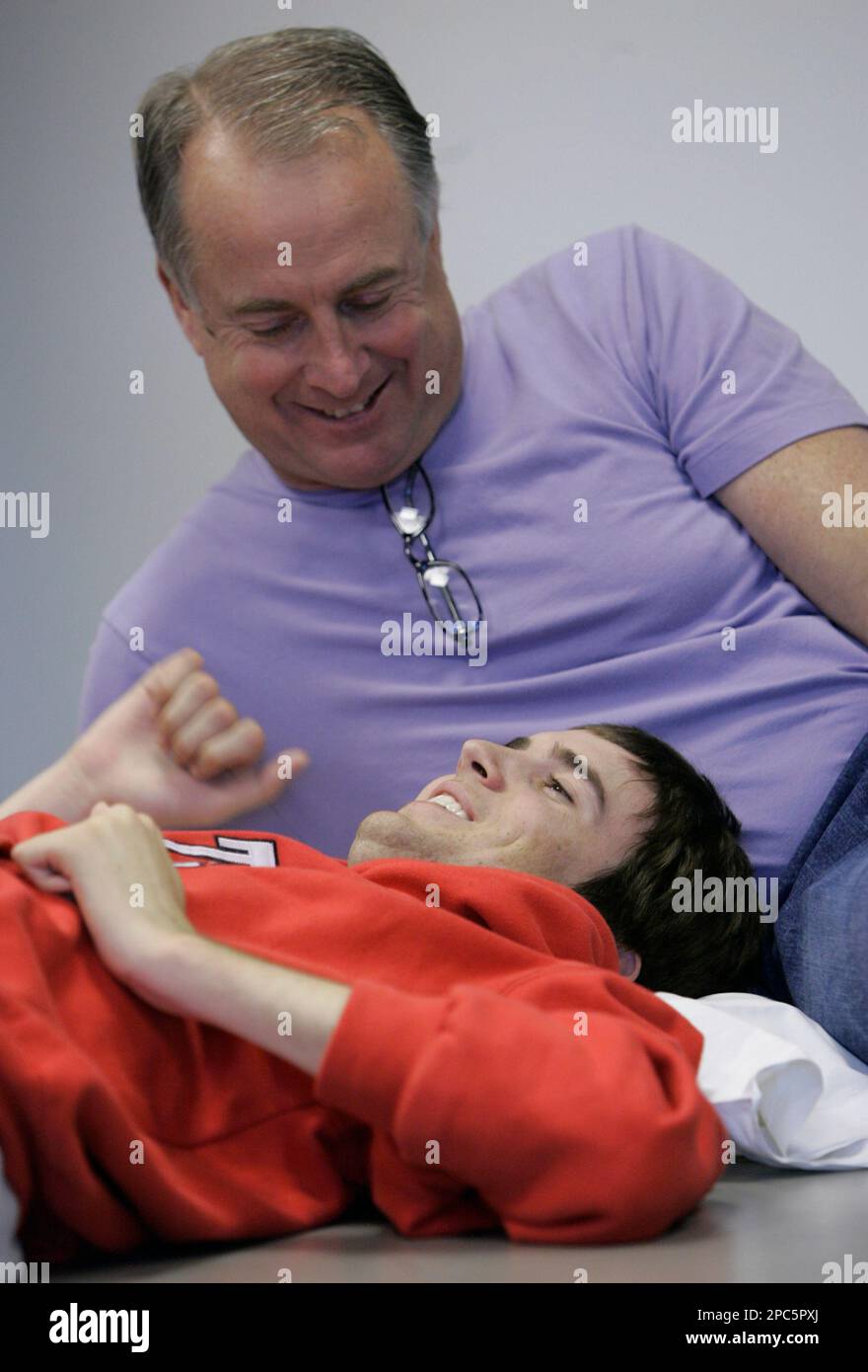 Tyson Gentry, bottom, swings his right fist at his father Bob as they ...