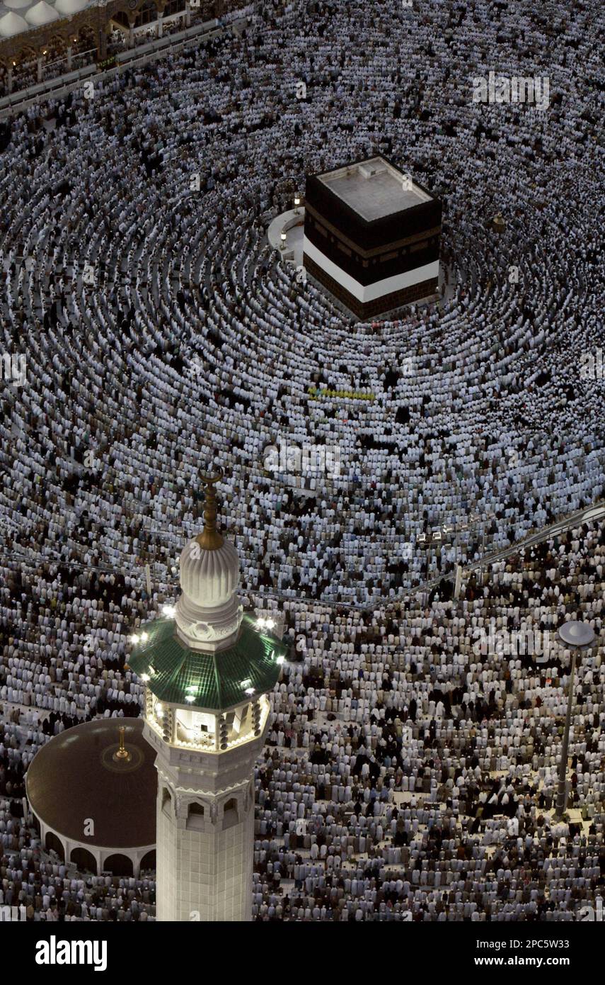 Tens of thousands of Muslim pilgrims attend the night prayers around ...