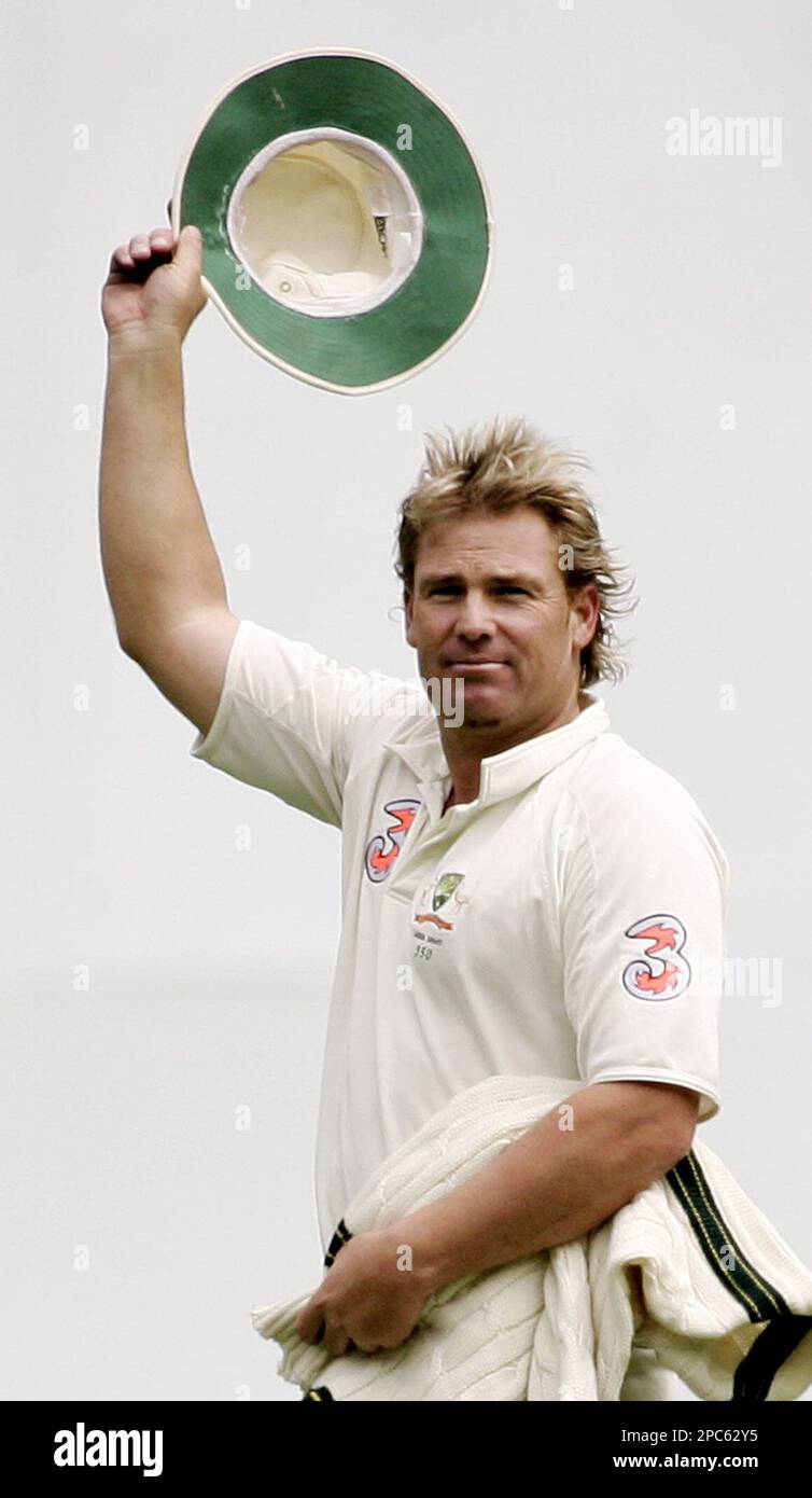 Australia's Shane Warne waves his hat at the end of the over where he ...