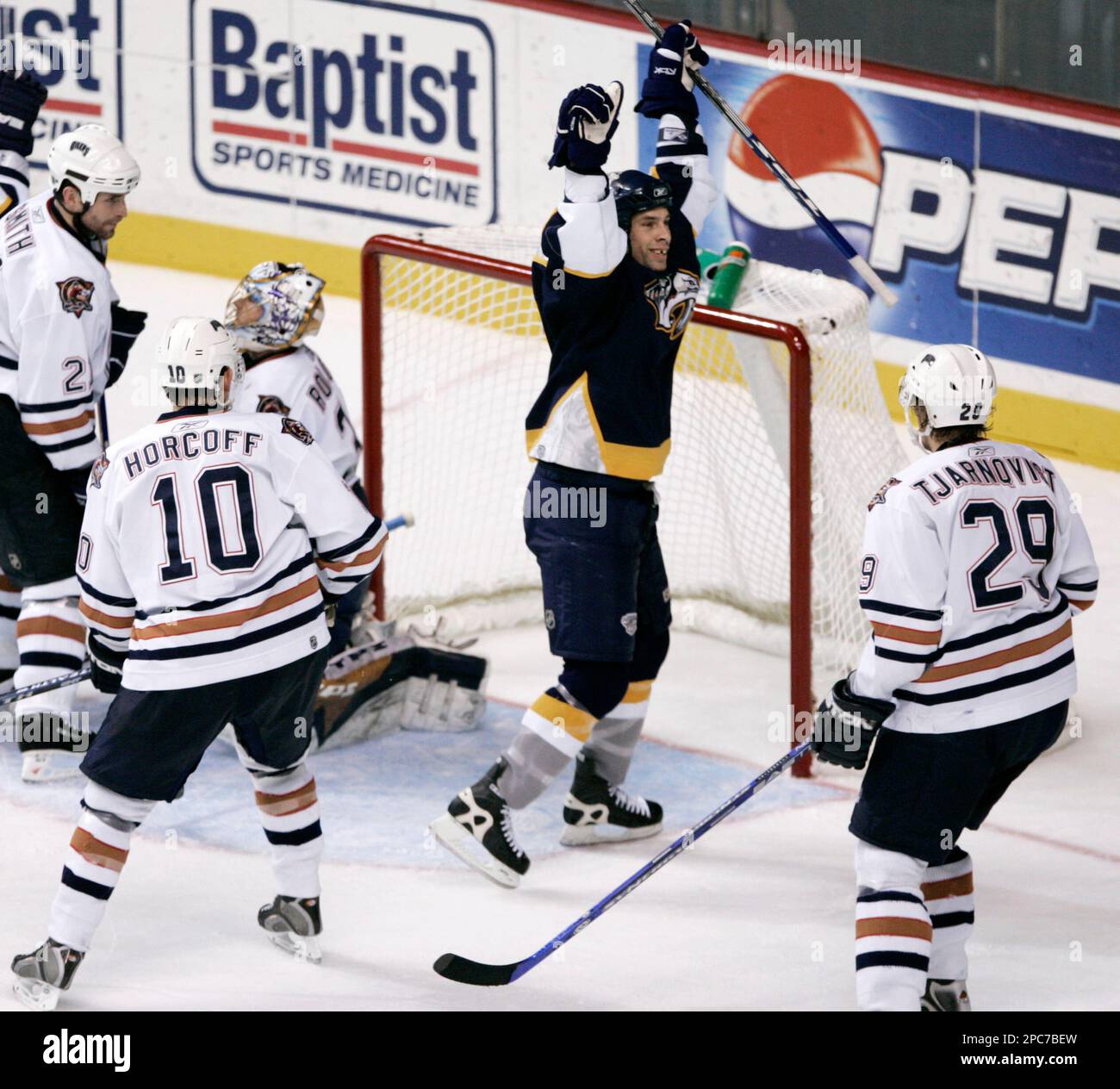 Nashville Predators center David Legwand (11), center, celebrates after ...