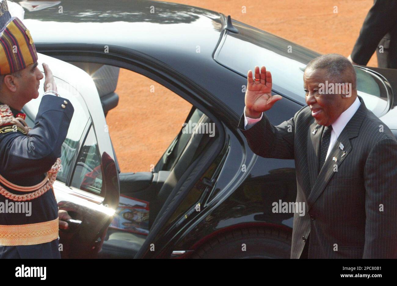 President of Botswana, Festus G. Mogae, right, gestures as he leaves ...