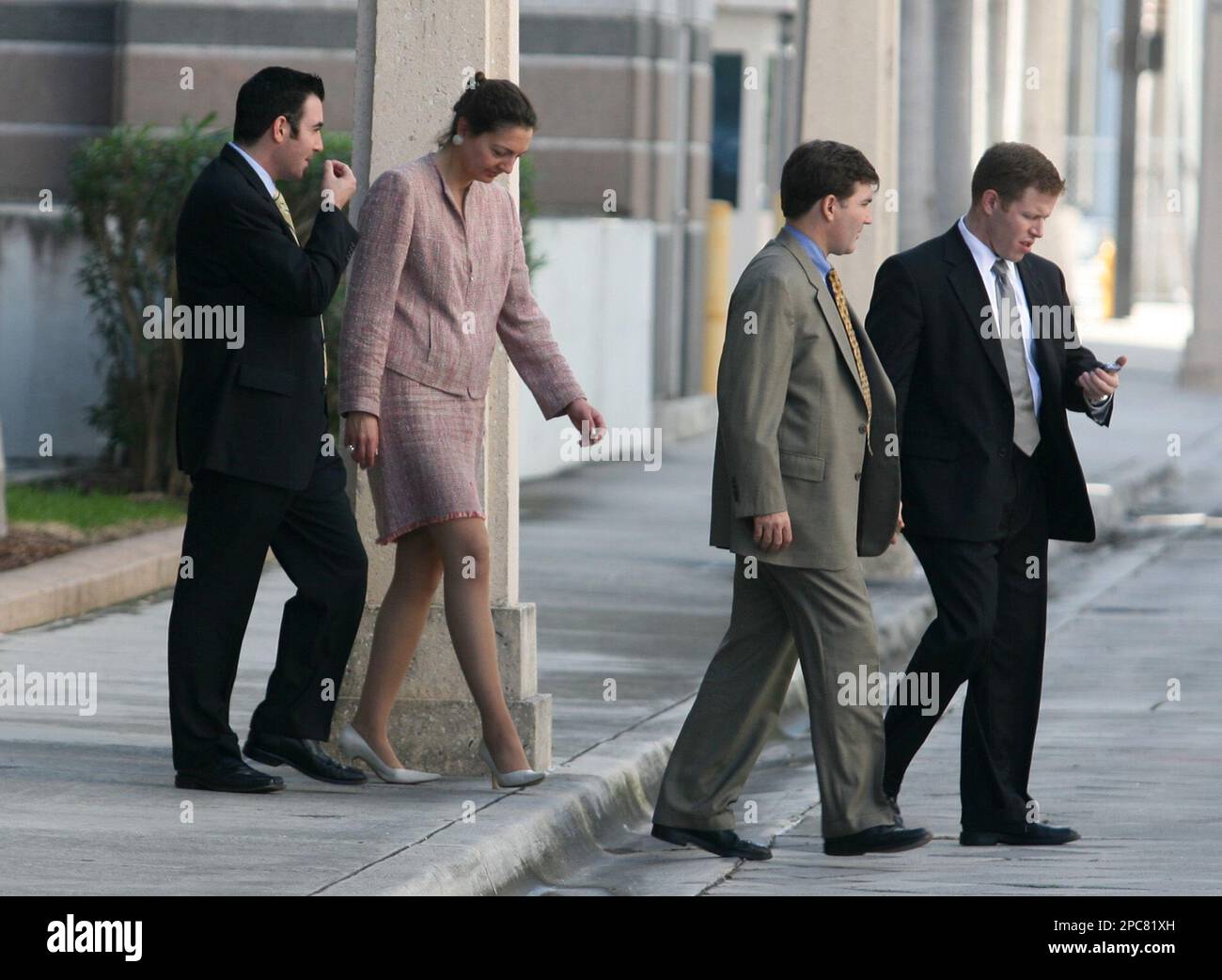Assistant U.S. Attorney Karen E. Rochlin, second from left, leaves the ...