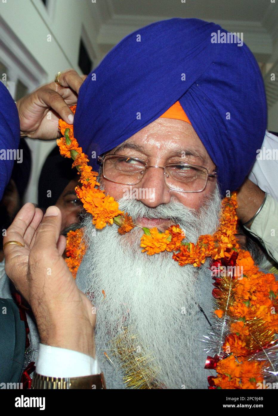 Newly elected President Avtar Singh is garlanded by a supprter after ...