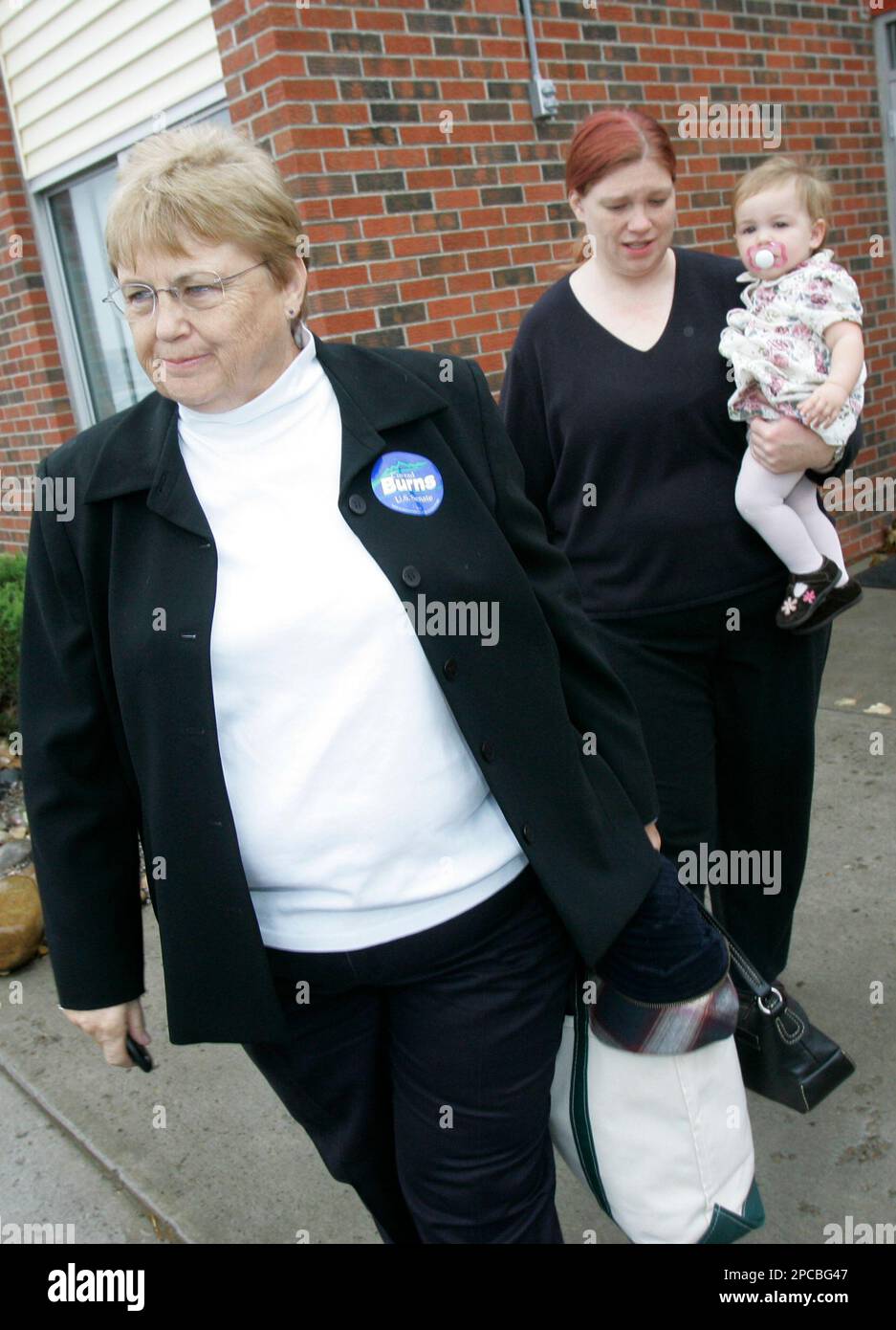Phyllis Burns, left, wife of Sen. Conrad Burns, R-Mont., leaves the ...