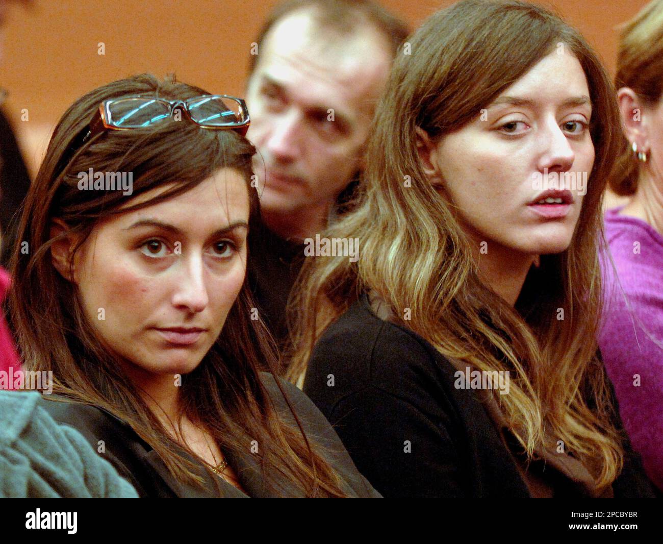 Angelique, left, and Celine Cecillon, attend the start of their father ...