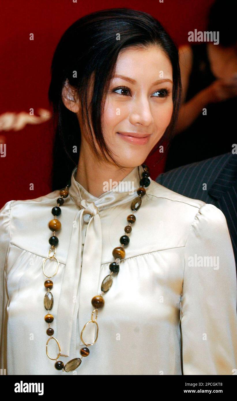 Hong Kong actress Michelle Reis poses for pictures at a charity event ...