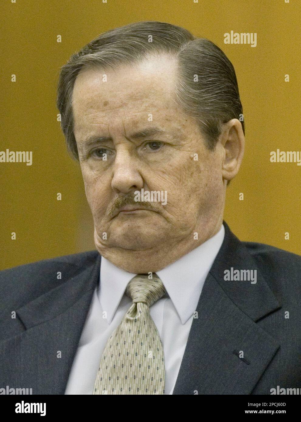 Nelson Serrano listens to testimony from Nicoletta Dosso, mother of ...