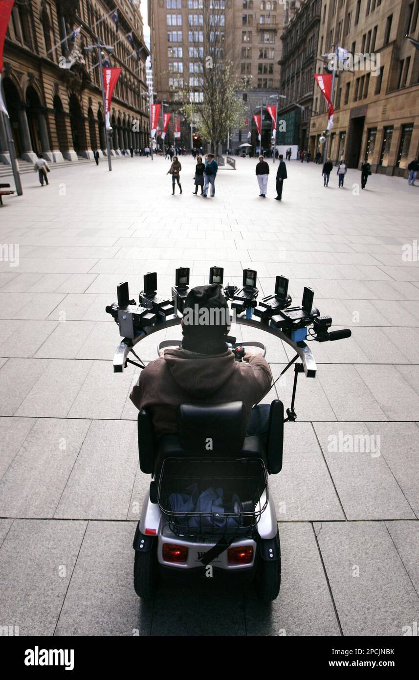 Video artist Daniel Crooks uses a motorized three-wheeled scooter with ...