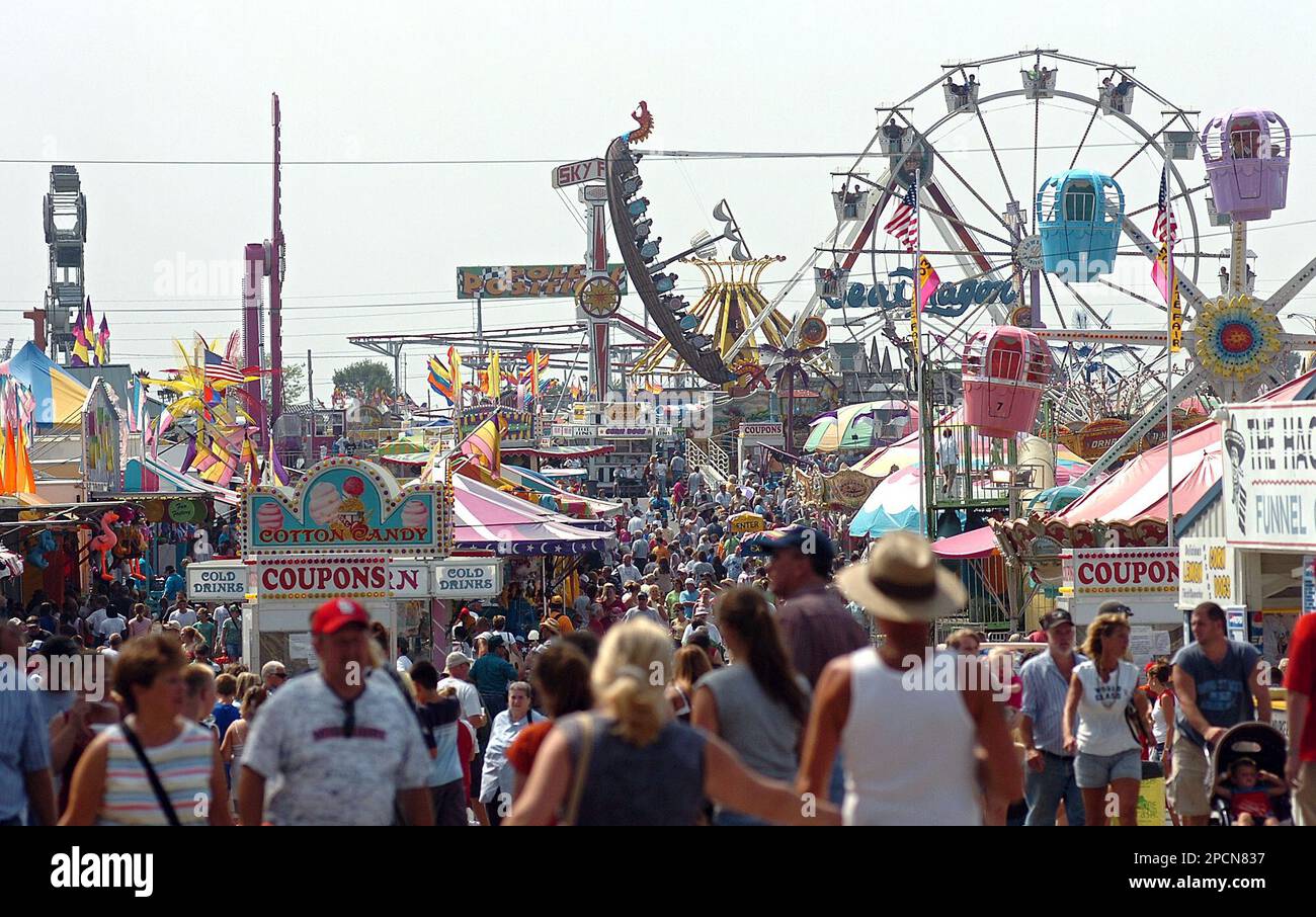 People take in the sights and sounds of the Missouri State Fair ...