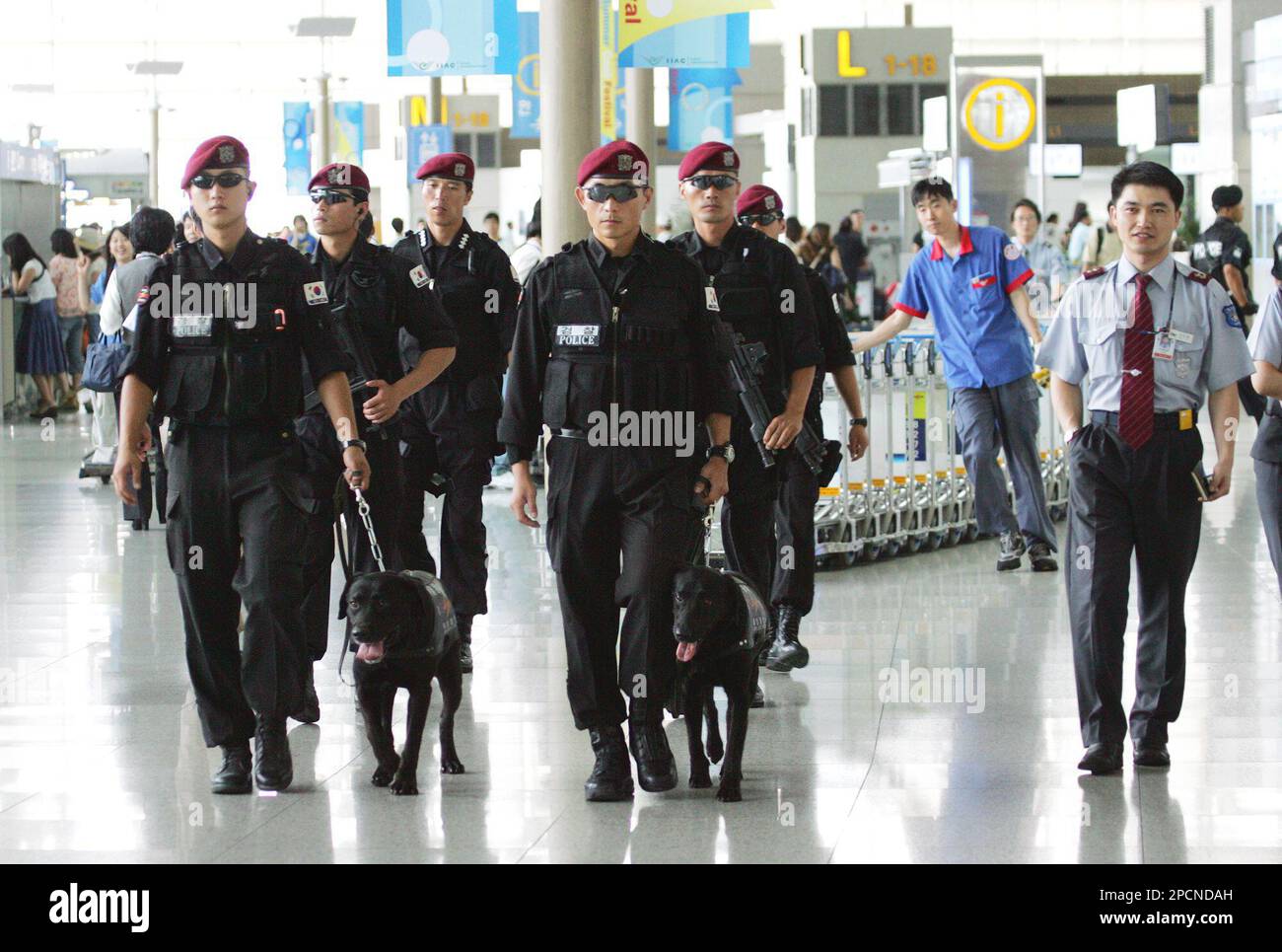 South Korean special police officers patrol around the Incheon ...