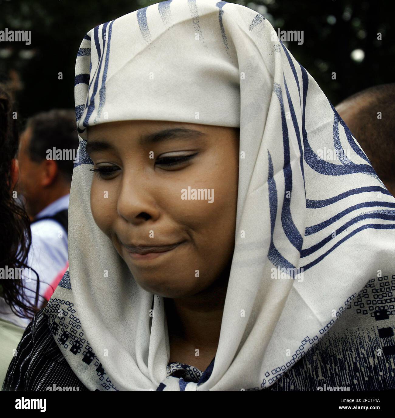 Elham Salah, of Lewiston, Maine, pauses to answer questions during an ...