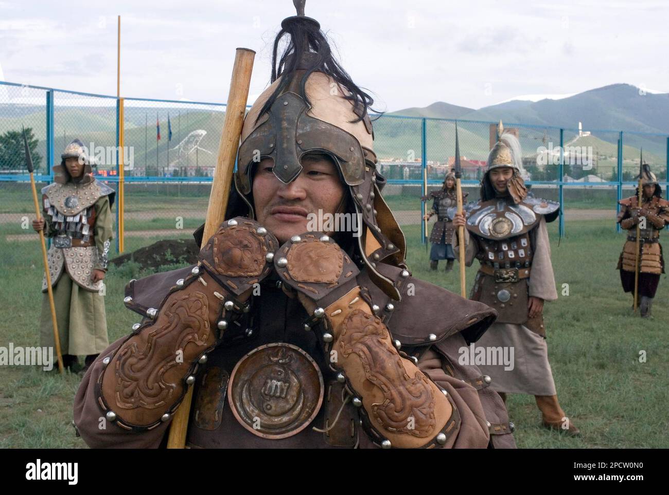 A Mongolian man dressed as a warrior in preparations for the annual ...