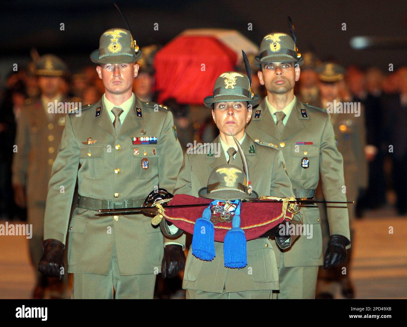 Italian Army Alpini corps officers look on at the arrival of the ...