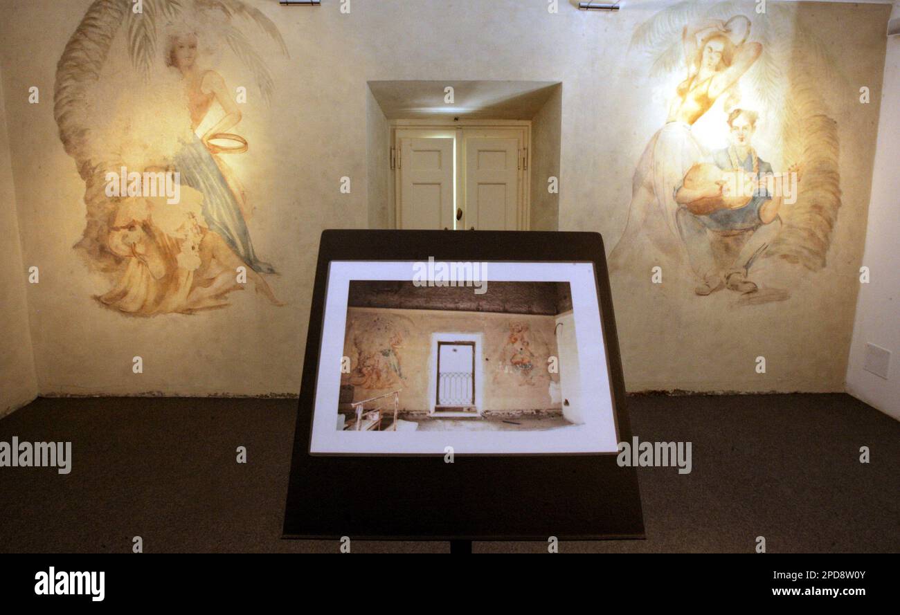 Life-size drawings of exotic dancers left by U.S. soldiers who set up ...