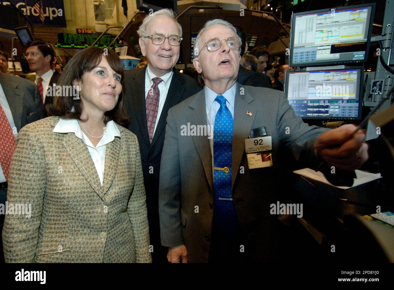 Business Wire President and CEO Cathy Baron Tamraz, left, and Berkshire ...