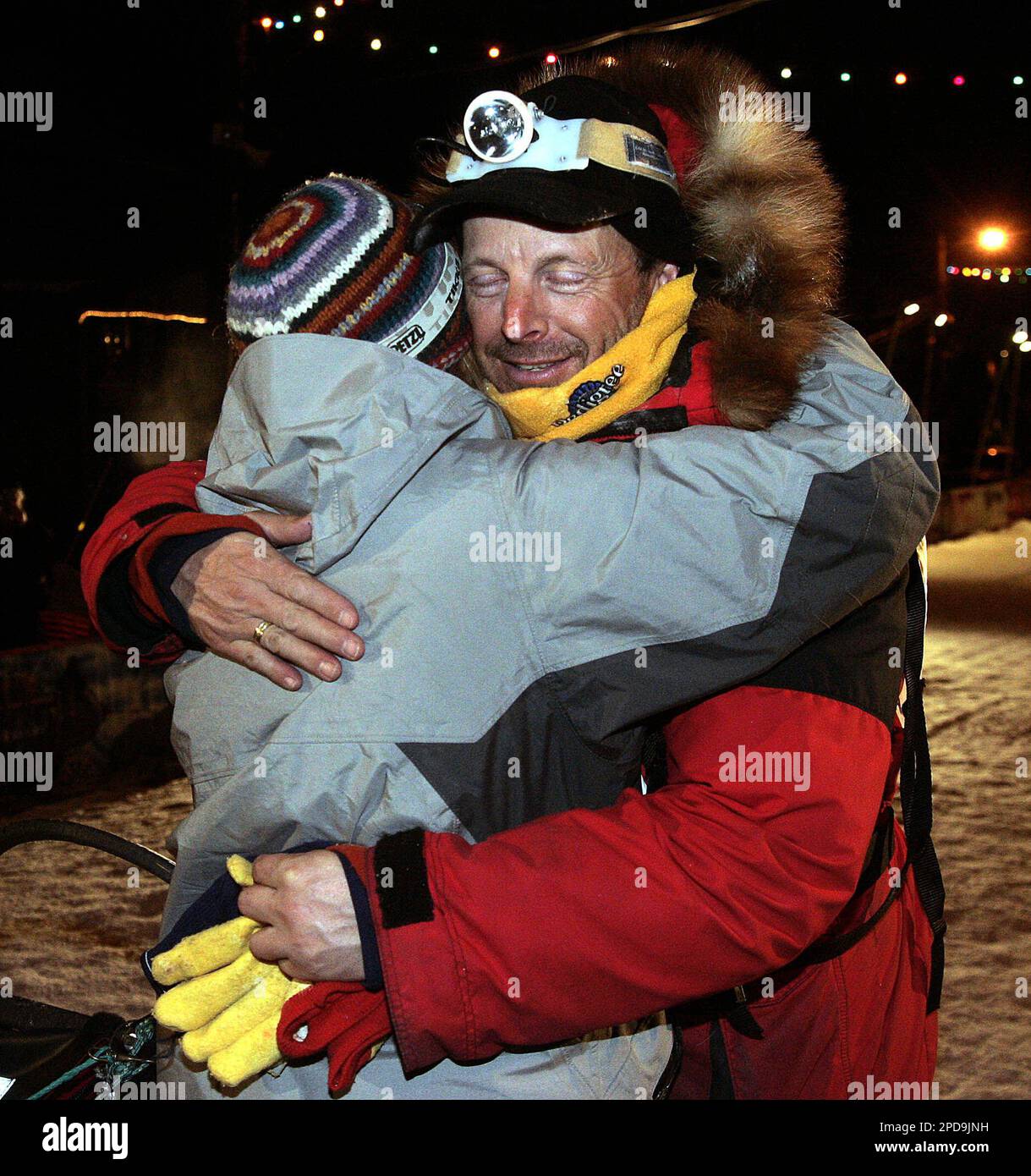 Doug Swingley, of Lincoln Mont. is greeted by his wife, Melanie ...