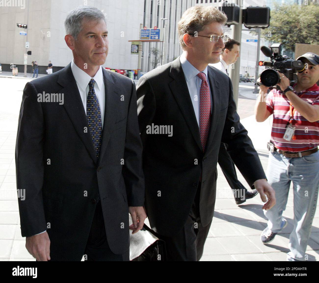 Former Enron CFO Andrew Fastow, left, and his attorney David Gergen ...