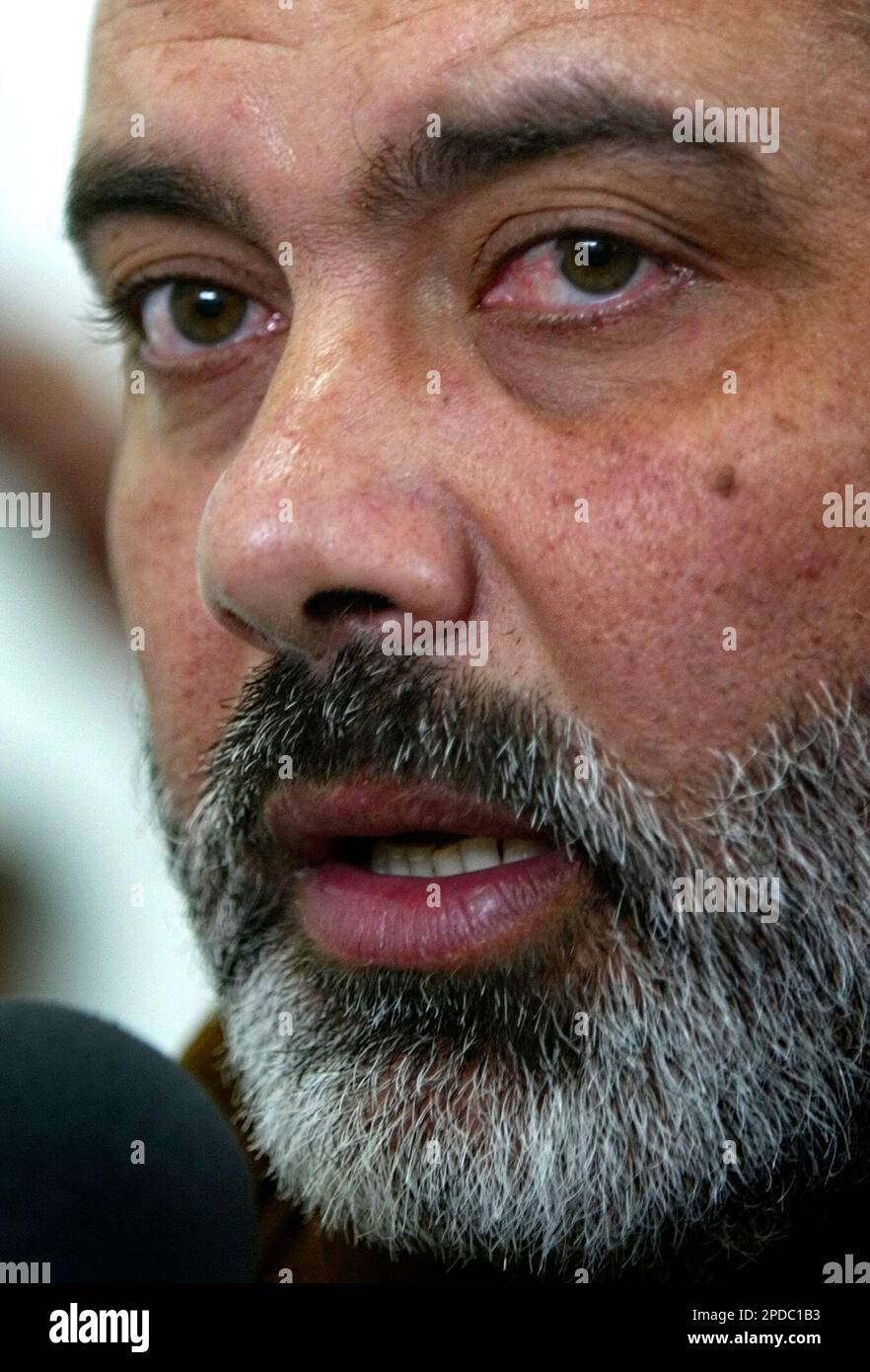 Ismail Haniyeh, a prominent Hamas lawmaker, speaks to the media inside ...