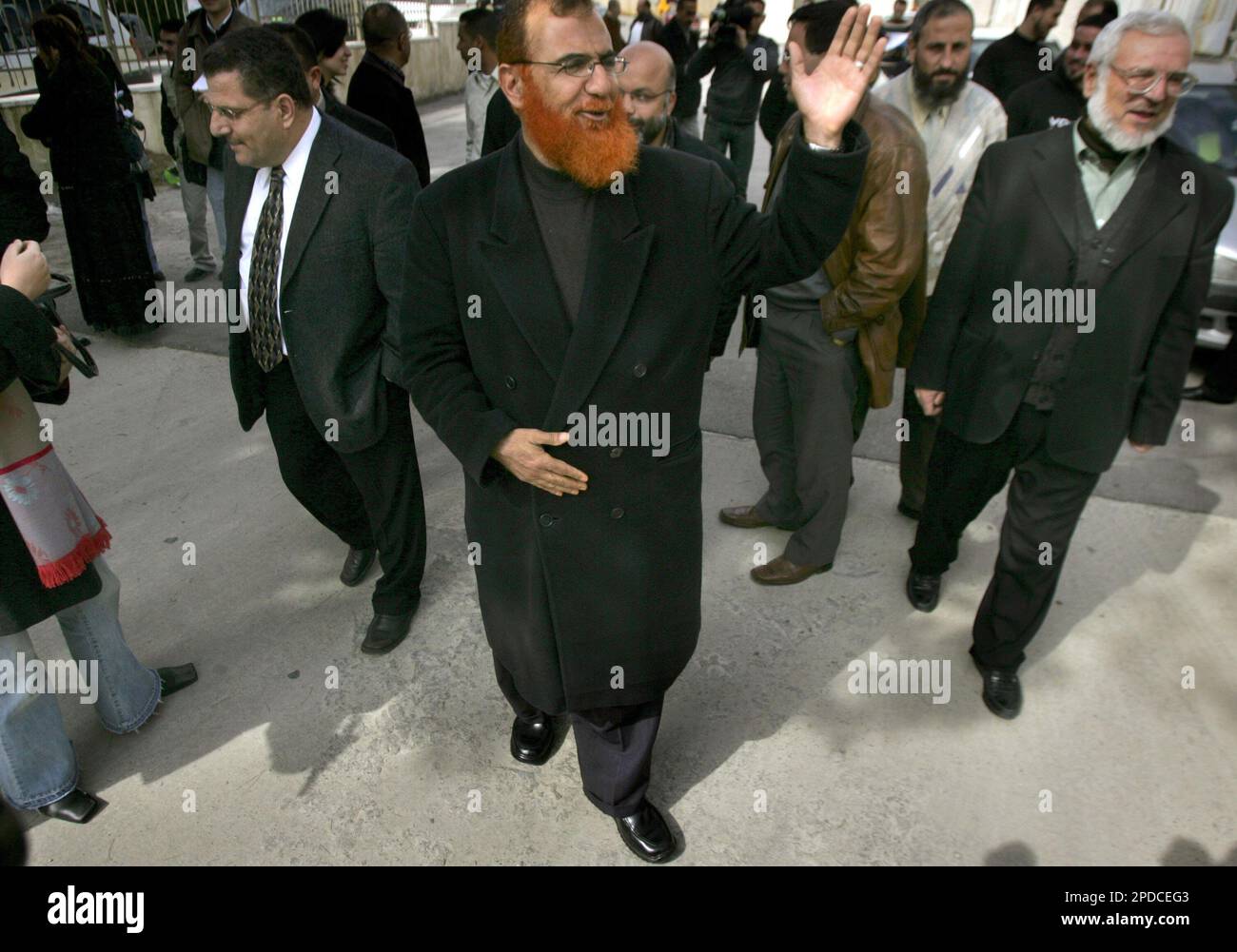 Islamic group Hamas new paliament member Mohammed Abu Teir salutes as ...