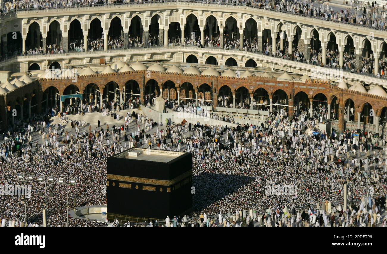 ** ONE OF NINE PICTURES ** Muslim pilgrims circle and pray around the ...