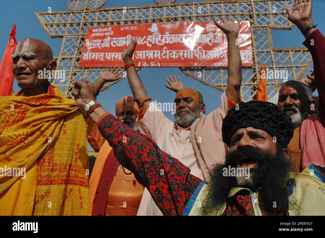 Sadhus or Hindu holy men protest against the blockade of flow of waters ...