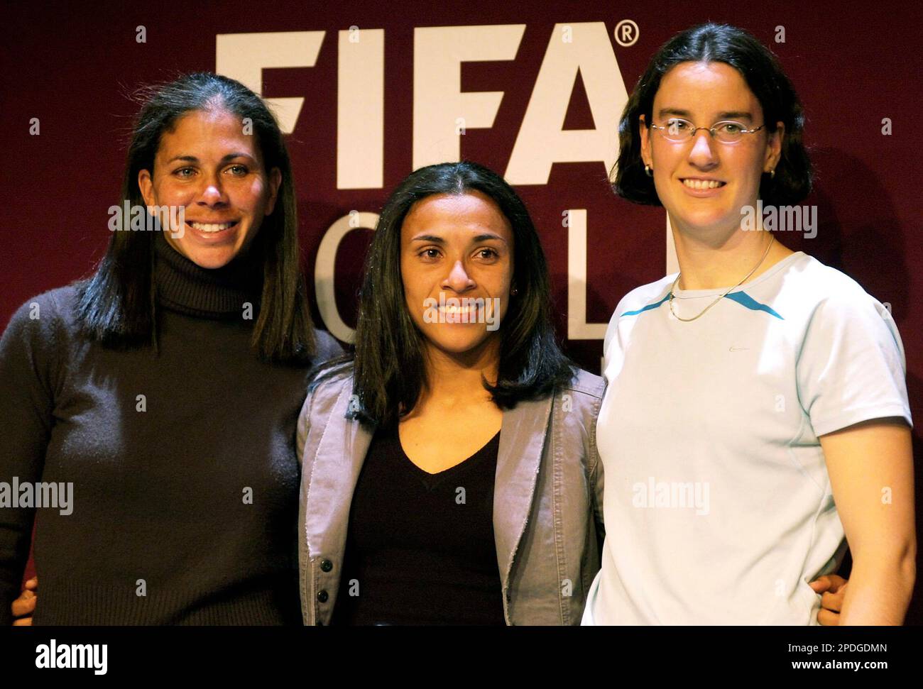 U.S. female national soccer team player Shannon Boxx, left, Brazil's ...