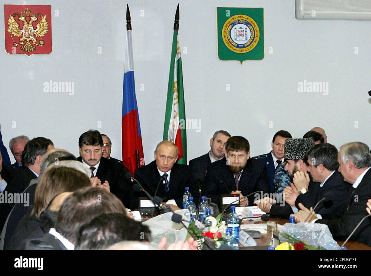 Russian President Vladimir Putin, center, attends the first session of ...