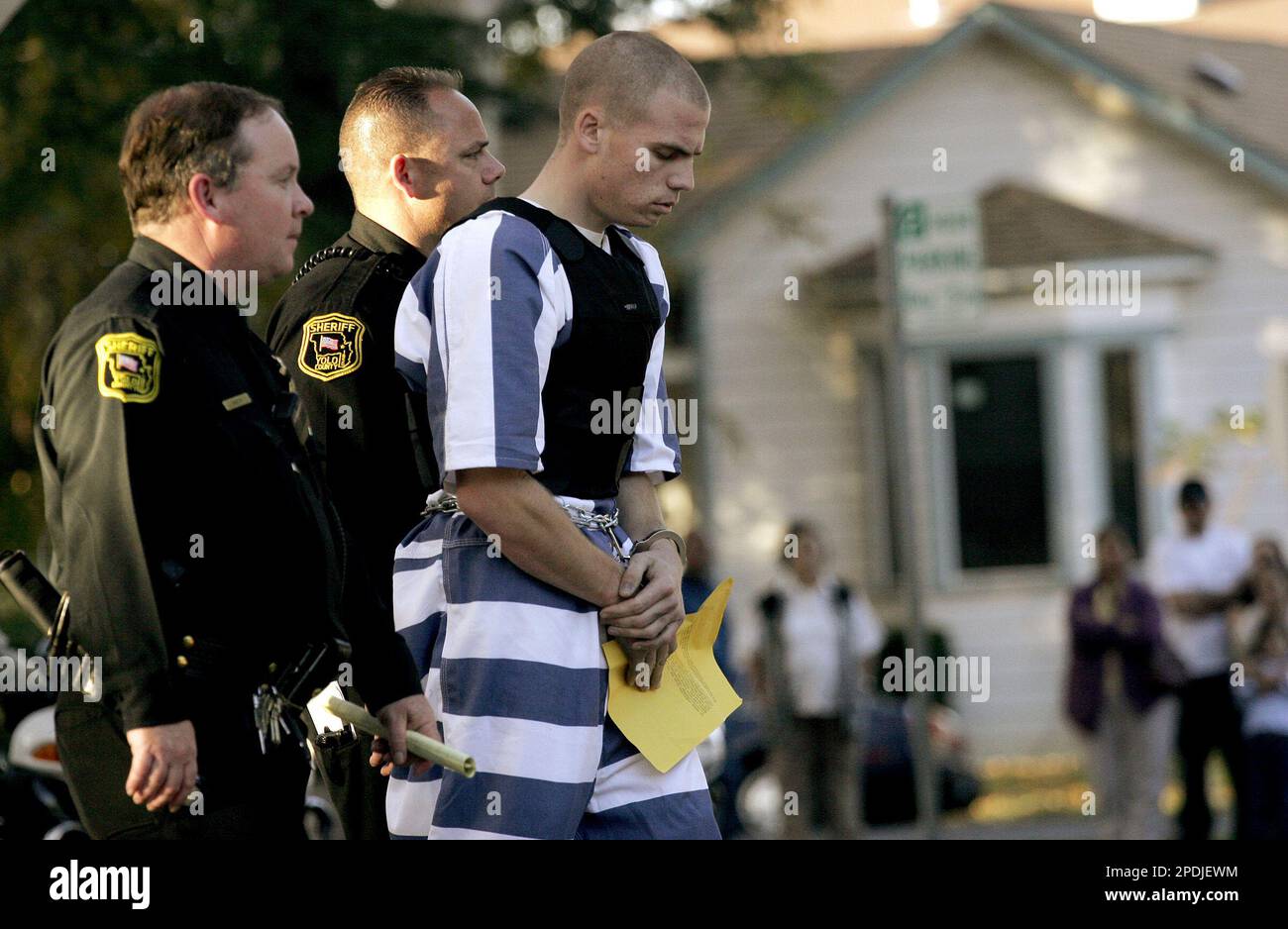 Brendt Anthony Volarvich, 20, of Roseville, Calif., is led out of the ...