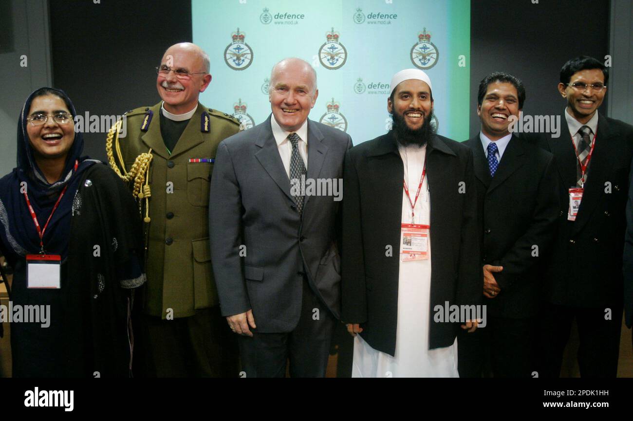 Britain's Secretary of State for Defence John Reid, third left, poses ...