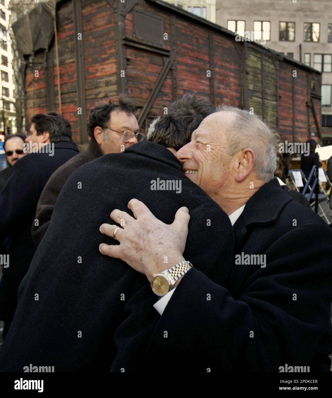 Samuel R. Harris, right, a Holocaust survivor and president of the ...