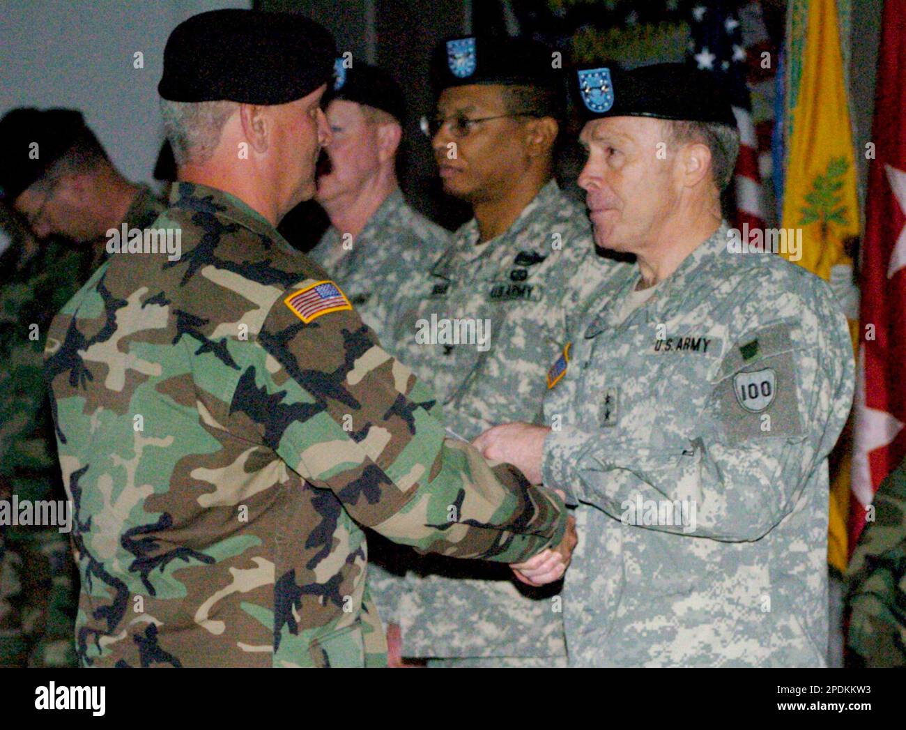 Command Sgt. Maj. Johnny McGuire receives medals and awards from Major ...