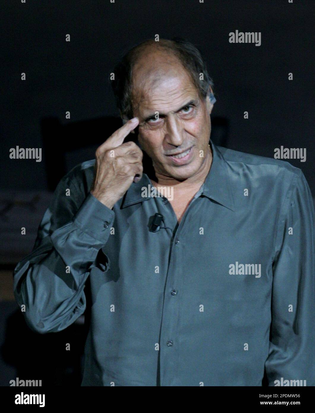 Adriano Celentano gestures during his monologue at the 'Rockpolitick ...
